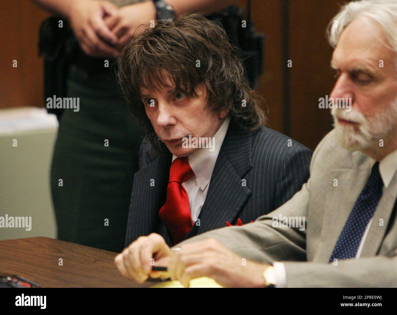 Music producer Phil Spector, center, and his attorney Dennis Riordan ...