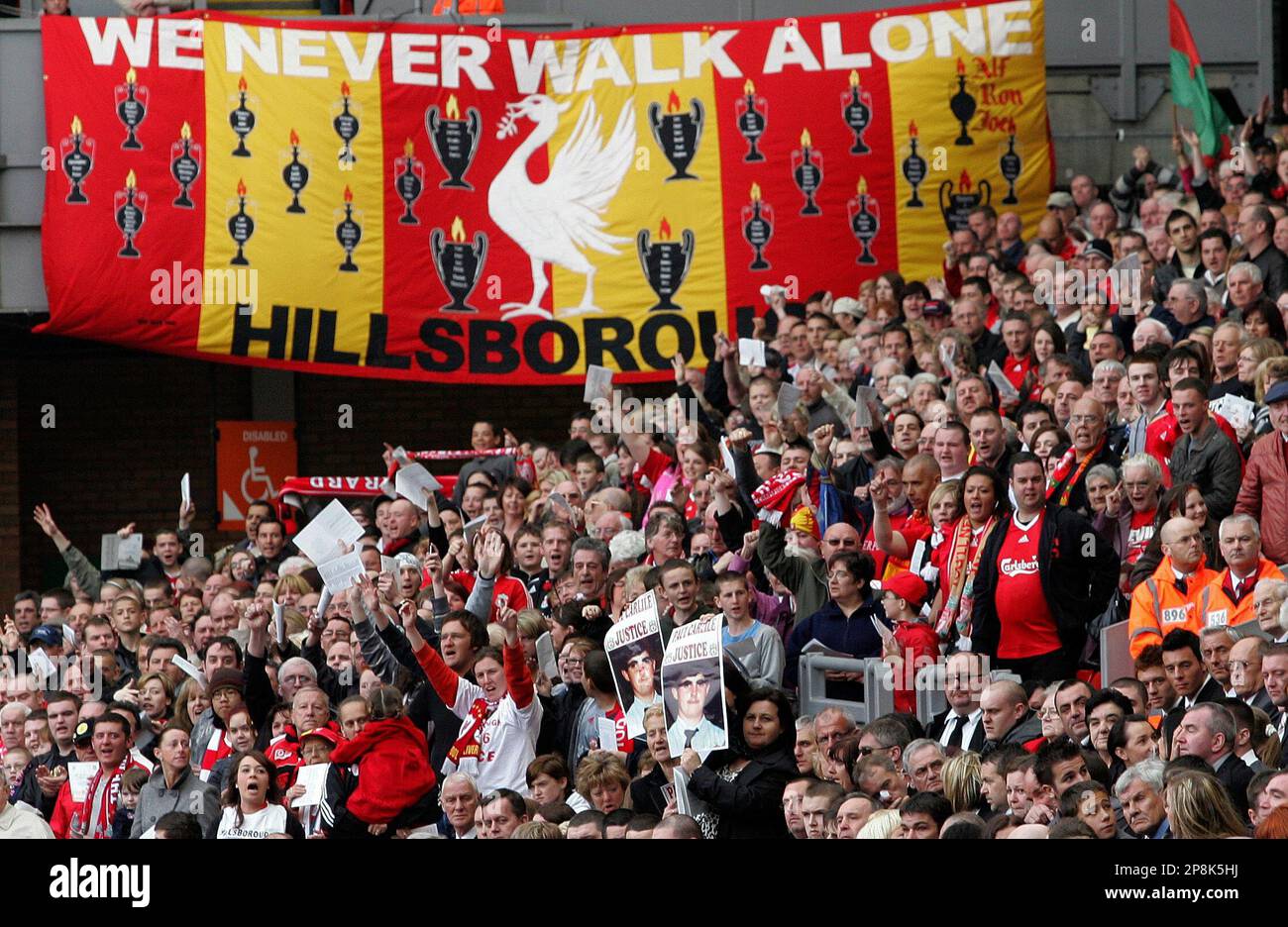 Soccer fans are seen during a memorial to mark the 20th anniversary of ...