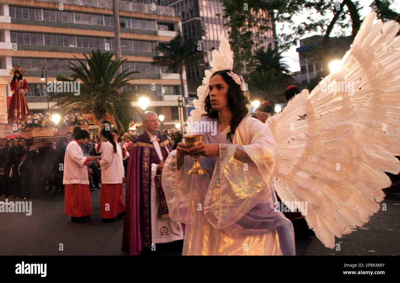 Faithful take part in a procession during Holy Week in San Jose ...