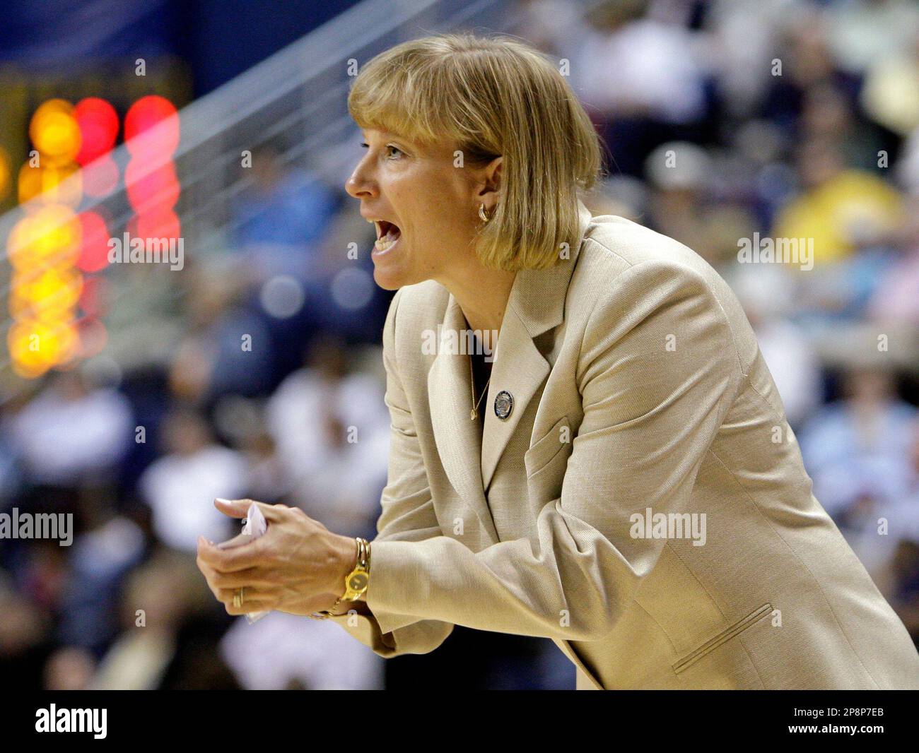 Purdue head coach Sharon Versyp yells to her team as they play ...