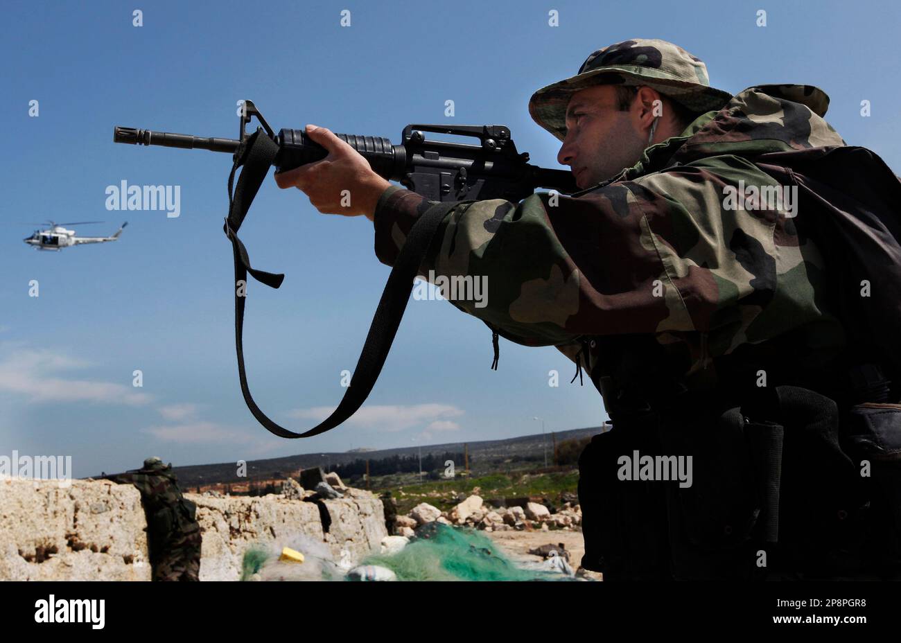 A Lebanese marine special forces soldier, drills during a joint ...