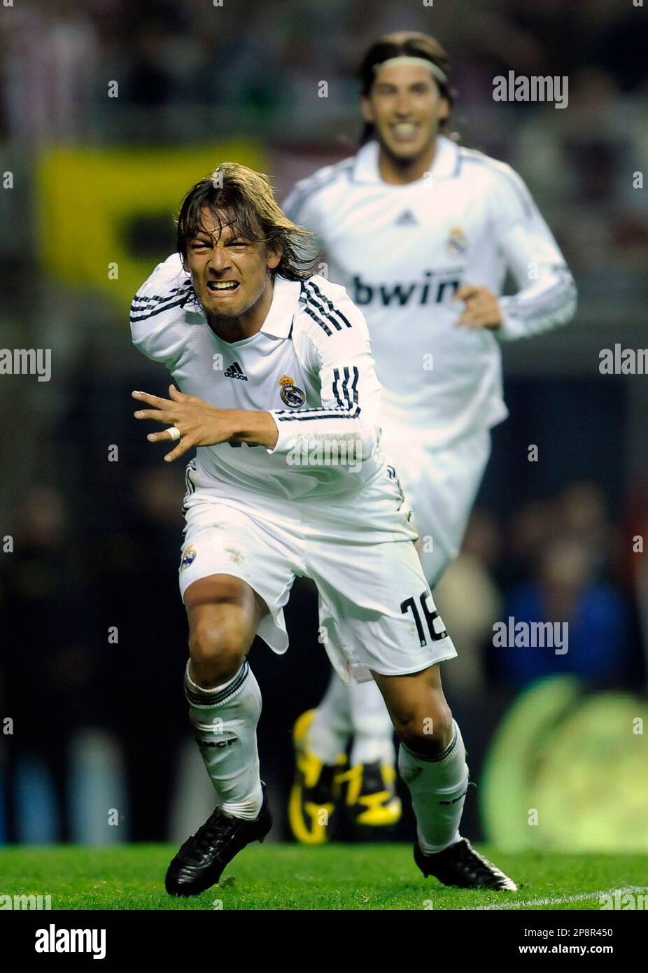 Real Madrid's Gabriel Heinze from Argentina, front, reacts after ...