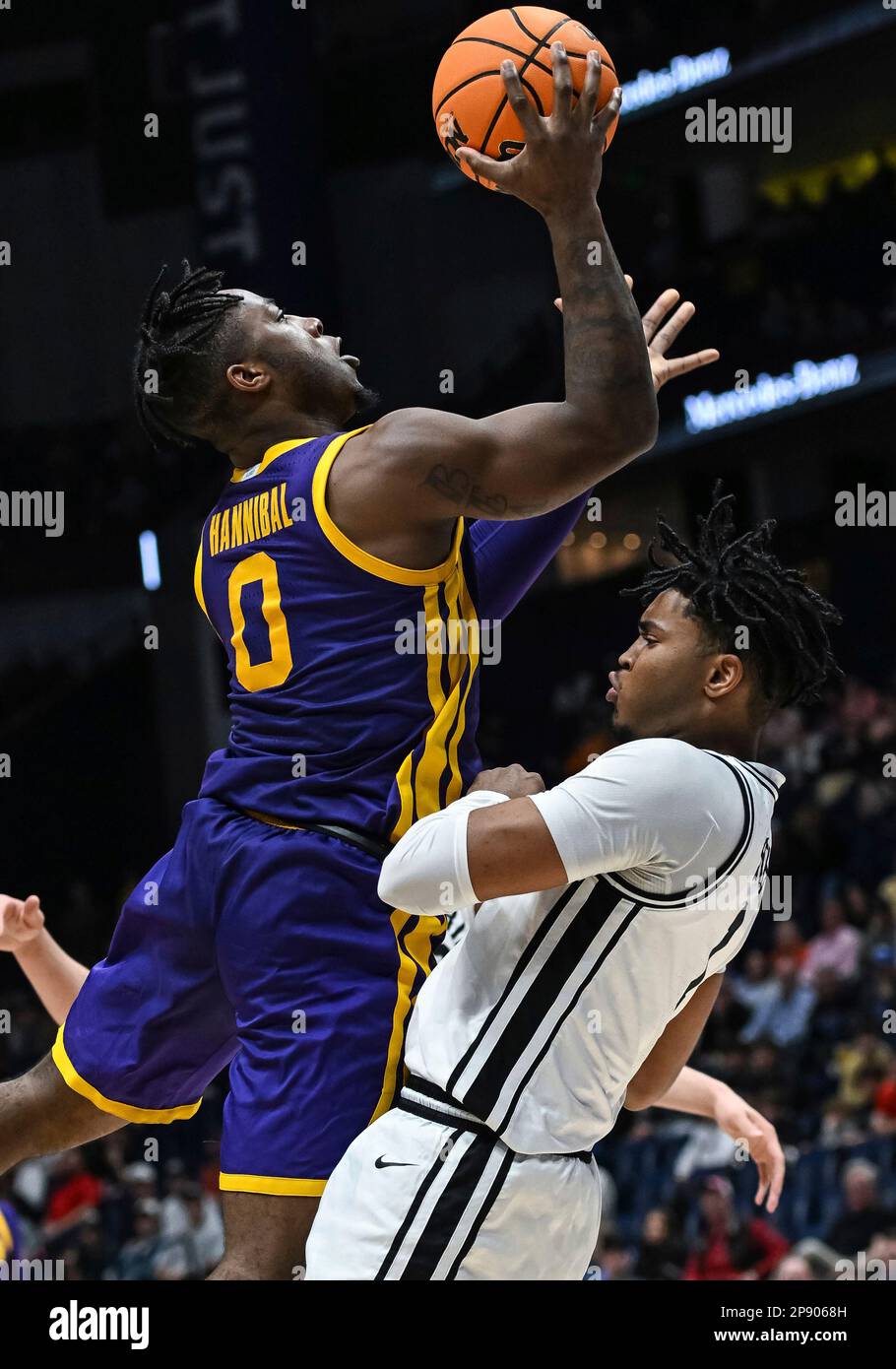 NASHVILLE, TN - MARCH 09: LSU Tigers guard Trae Hannibal (0) takes a shot over Vanderbilt ...