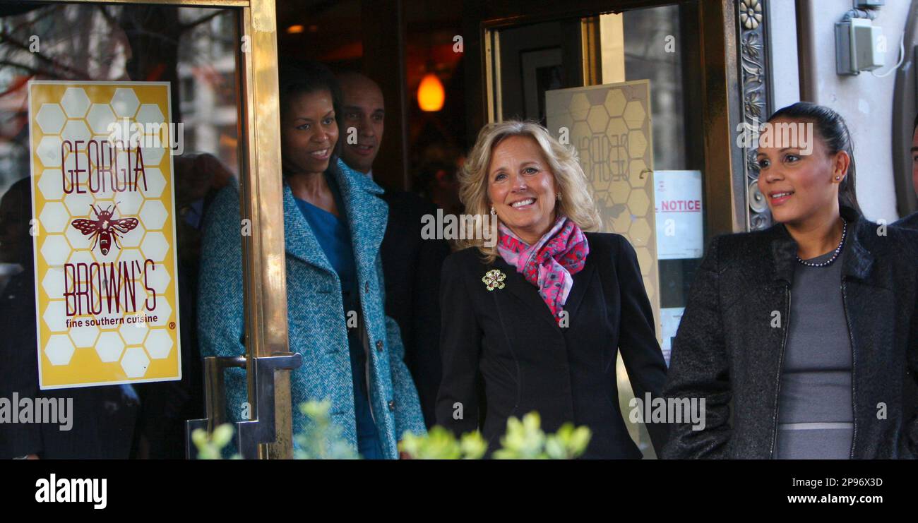From left, first lady Michelle Obama, Washington Mayor Adrian Fenty ...