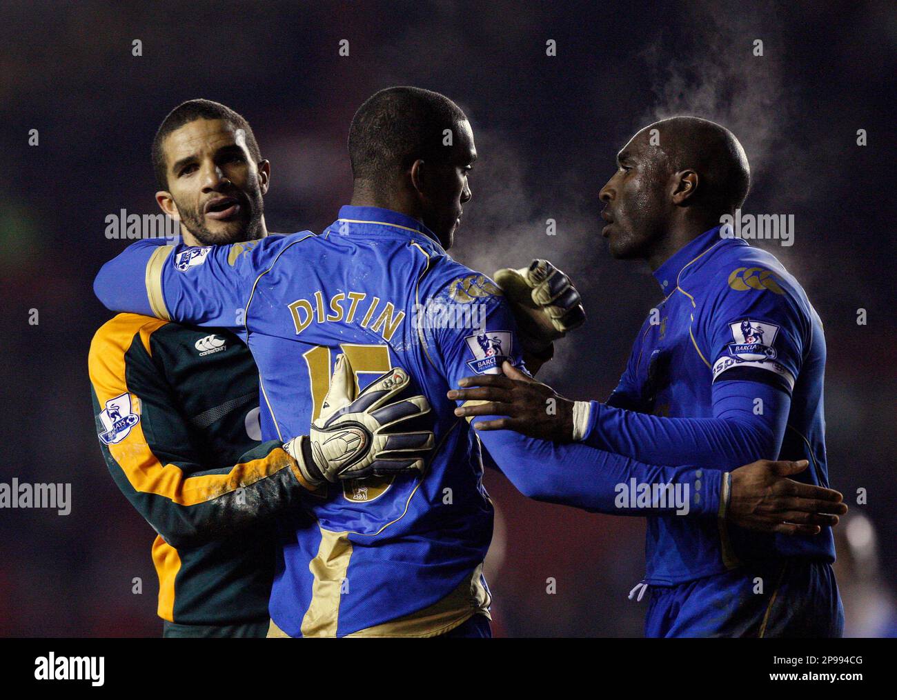 Portsmouth's David James, left, and fellow team members Sylvain Distin ...