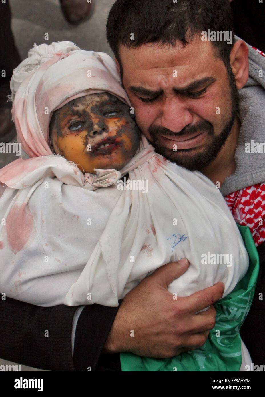 ** EDS NOTE GRAPHIC CONTENT ** The body of one of the children of Hamas ...