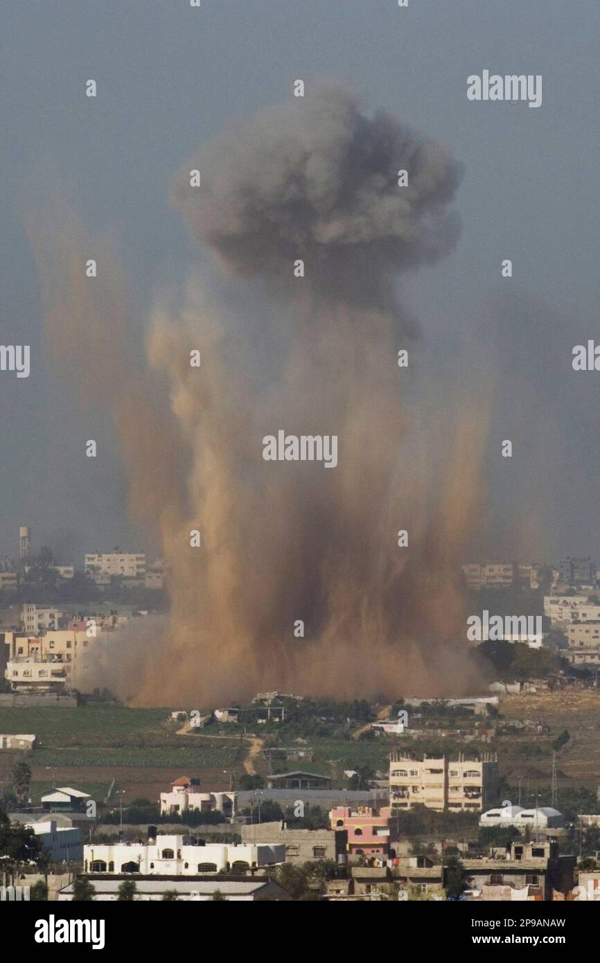An explosion from an Israeli missile strike in the northern Gaza Strip ...