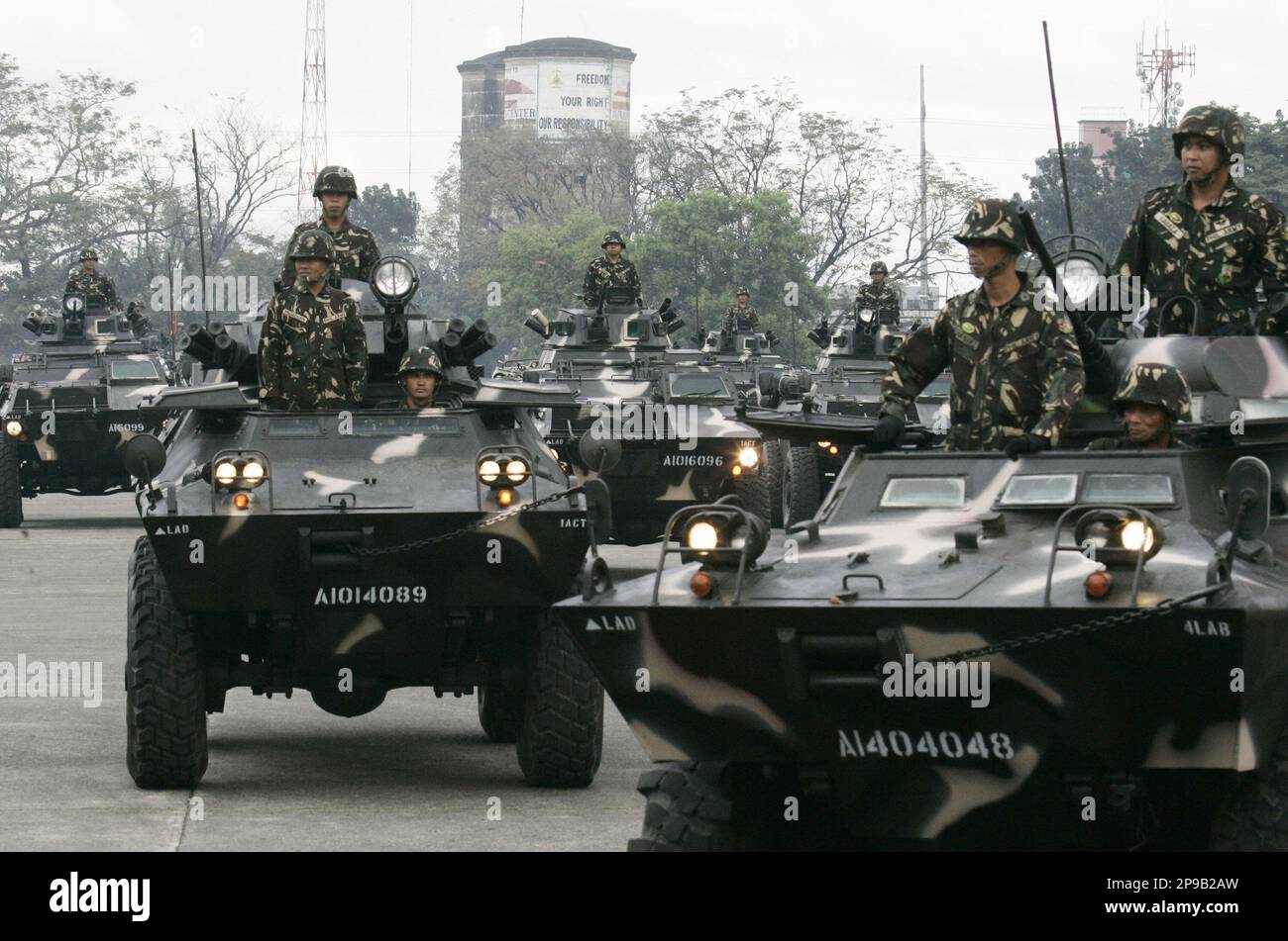 Simba armored personnel carriers roll past the grandstand during a ...