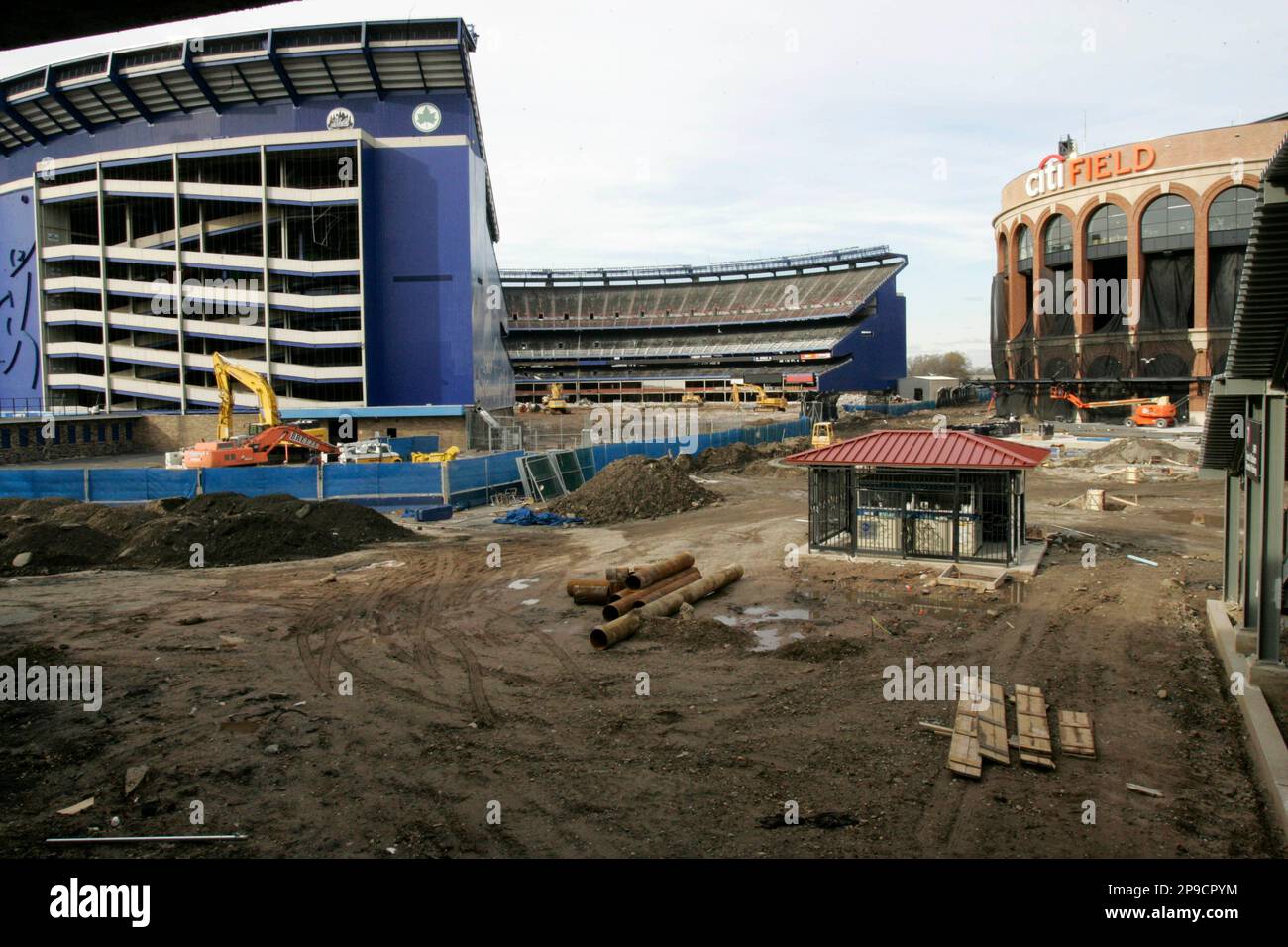 Construction continues at Citi Field, right, the new stadium being ...