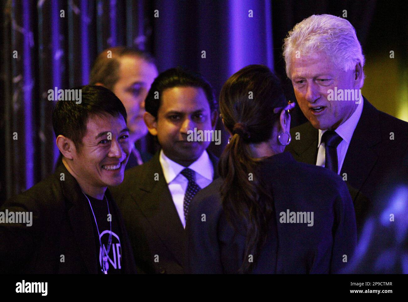 Former U.S. President Bill Clinton, right, Malaysian actress Michelle ...