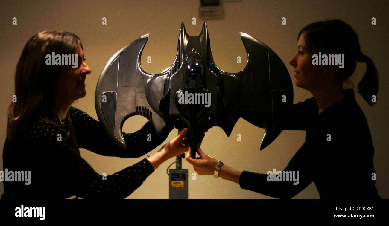 Christie's employees pose for photographs with a rare detailed 1/12th ...