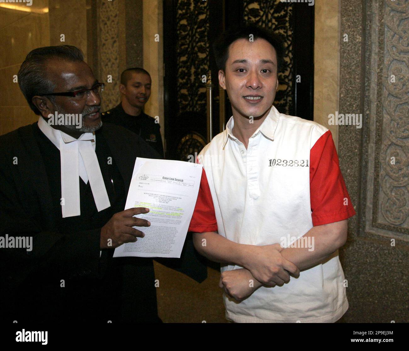 Hong Kong man Chan King Yu, right, smiles following his release at a ...