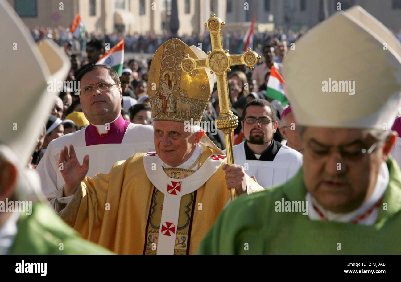 Pope Benedict XVI, center, arrives to celebrate an open-air ...