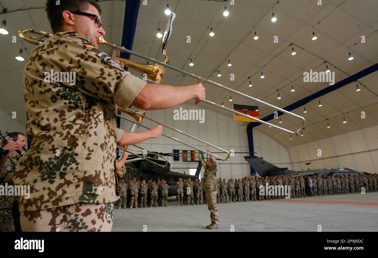 German ISAF soldiers line up during ceremonies commemorating German ...