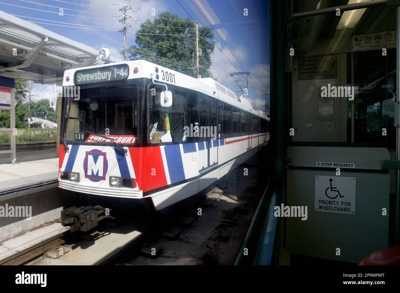 Two trains pass on the Shrewsbury extension section of the MetroLink ...