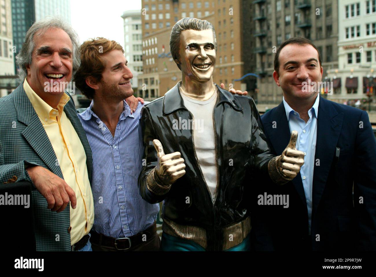 Actor Henry Winkler, left, poses with his sons Max Winkler, second left ...