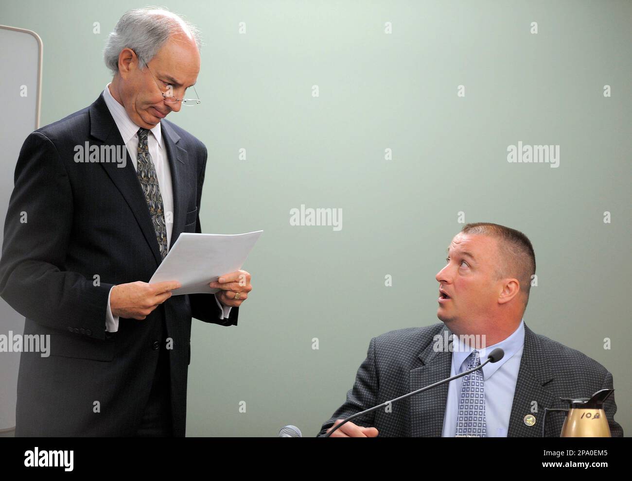 Defense attorney Elliot Weinstein, left, cross examines Medford, Mass ...