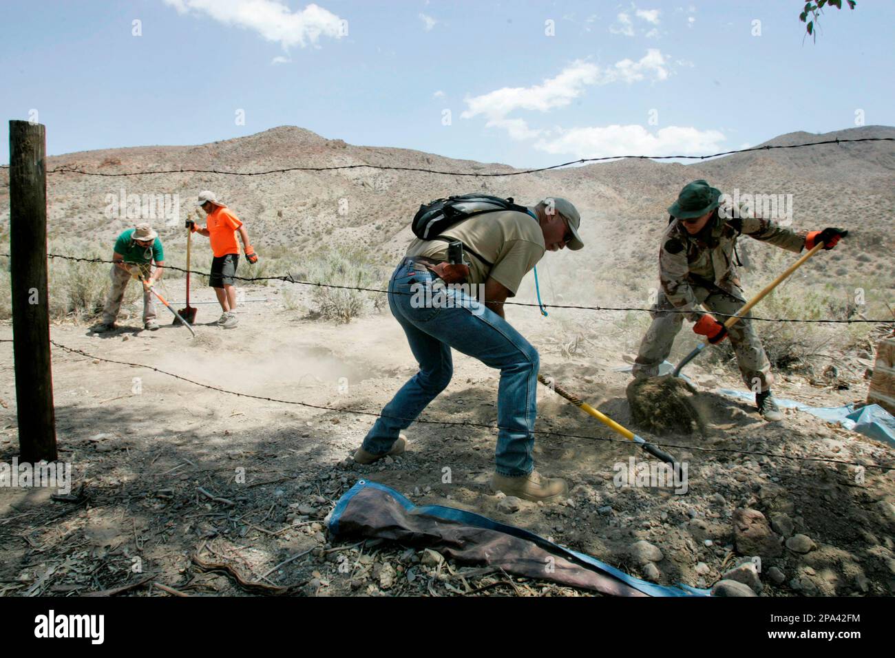 Investigators, from left, Kelvin Johnston, Dave German, Ed Spann and ...