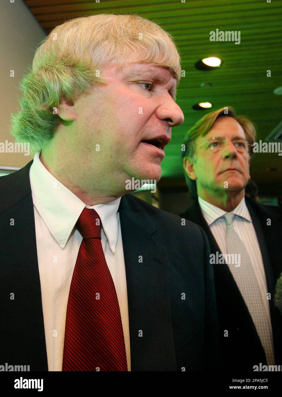 Former Alaska state Representative Vic Kohring, left, stands next to ...