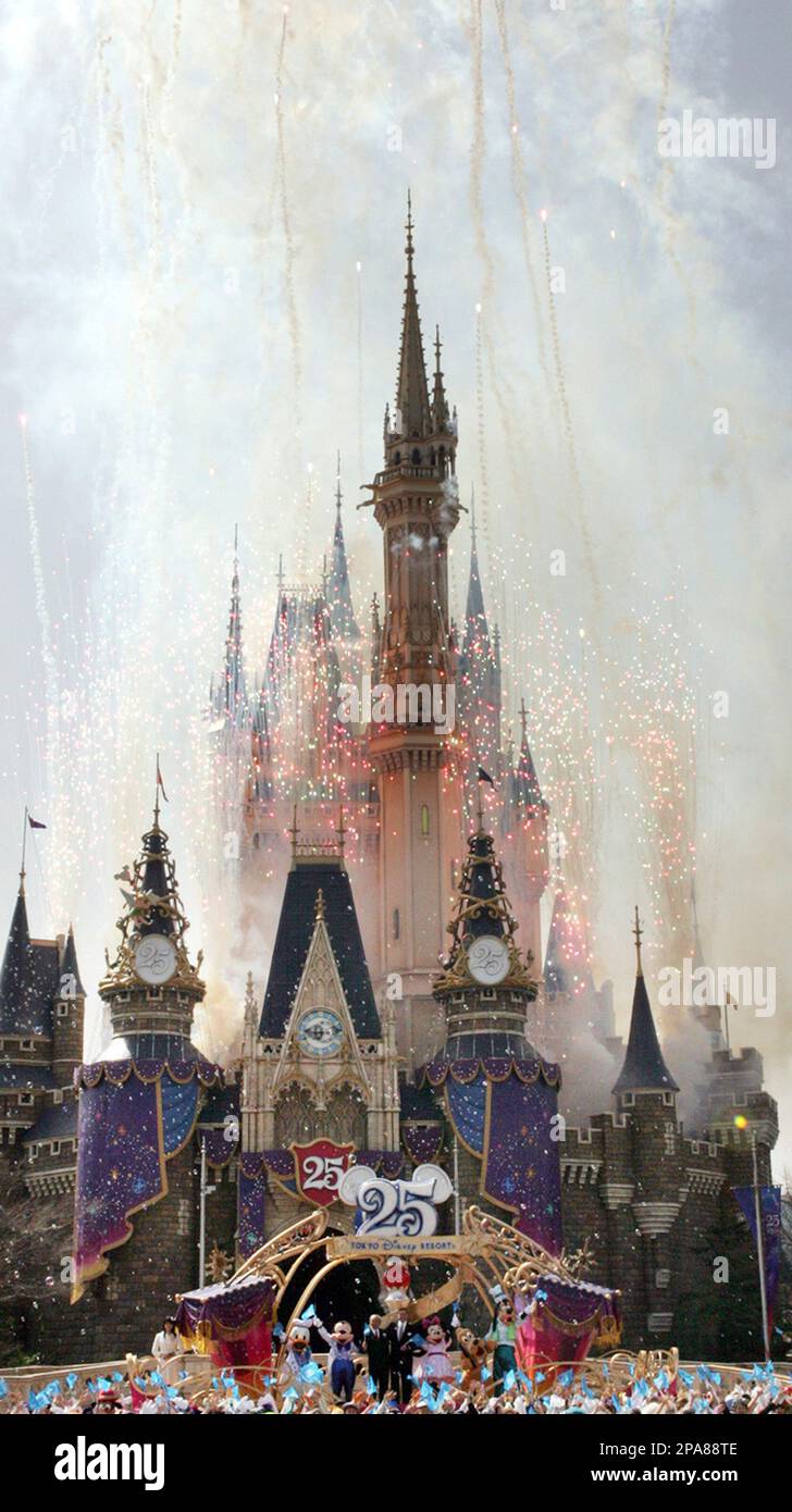 Fireworks explode in front of the Cinderella Castle during the ceremony ...
