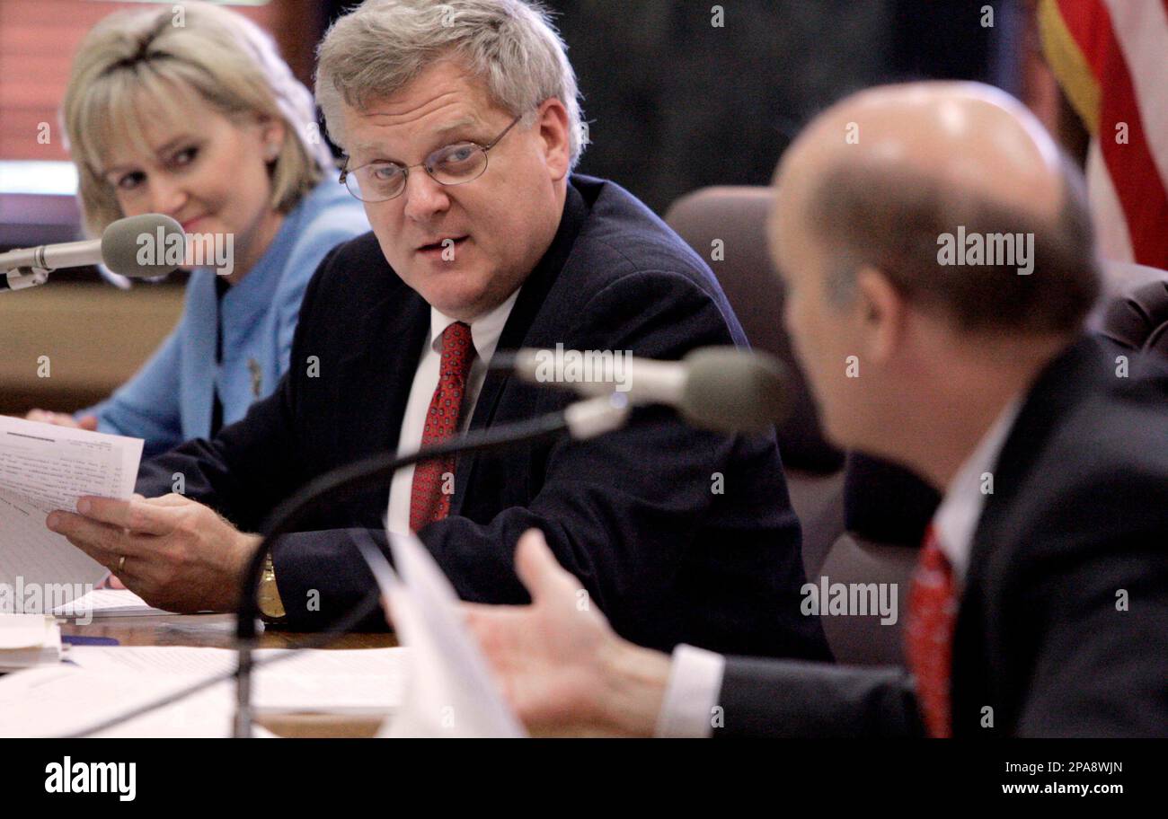 Sen. Cindy Hyde-Smith, D-Brookhaven, left, listens as her colleague ...