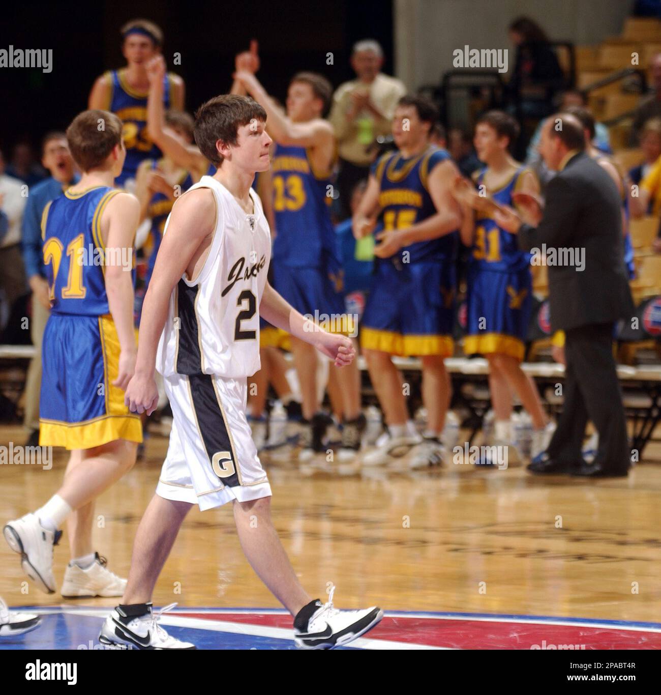 Glasgow's Hank Wellborn walks off the court as Jefferson players ...