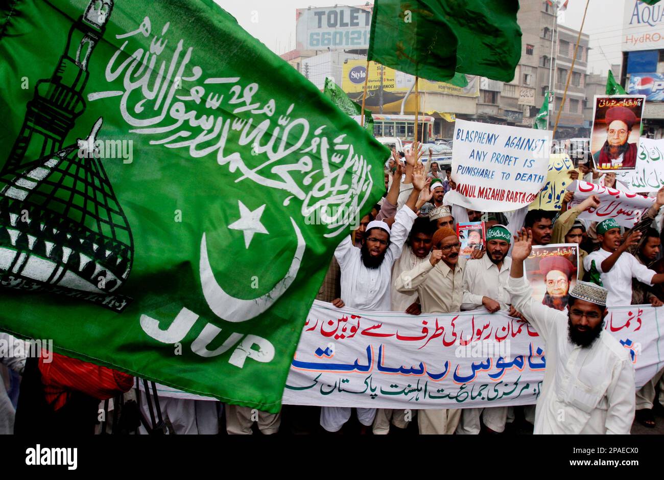 Activists of Pakistan's religious party Jamiat Ulema Pakistan hold a ...