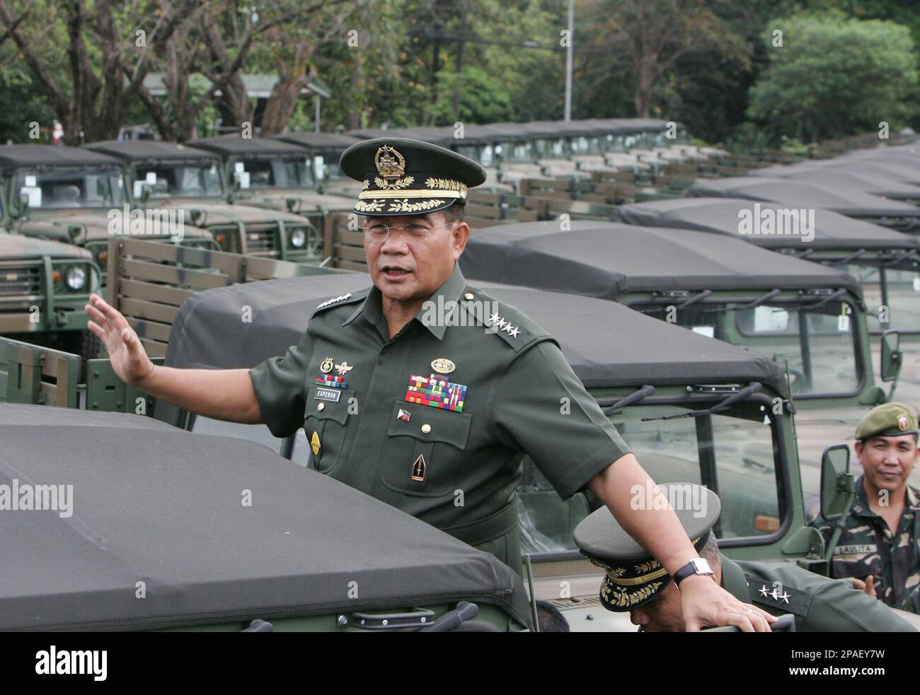 Philippine Armed Forces Chief Gen. Hermogenes Esperon Jr. boards one of ...