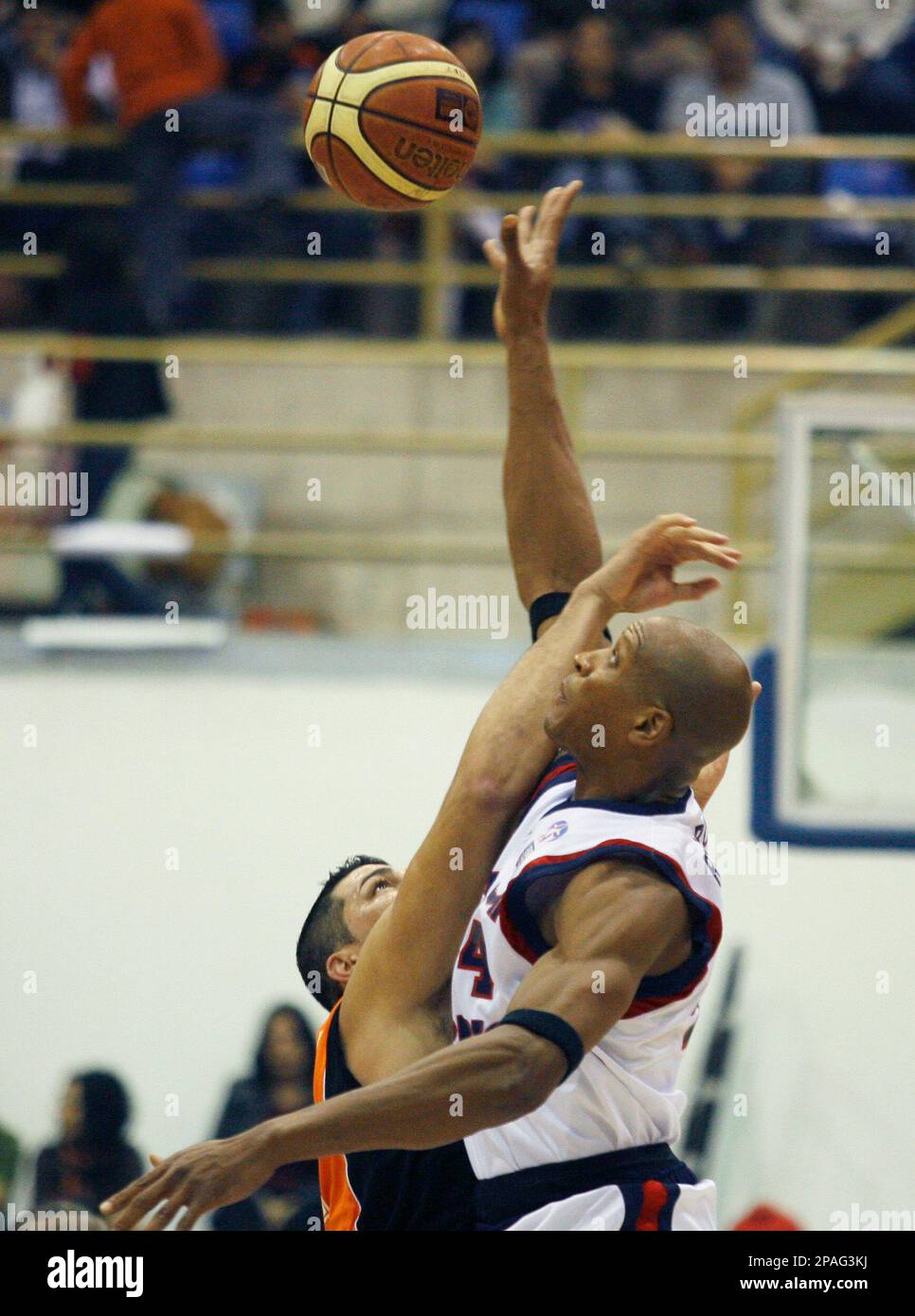 Ja Ja Richards, of US Miami Tropics, right, jumps for the ball as ...