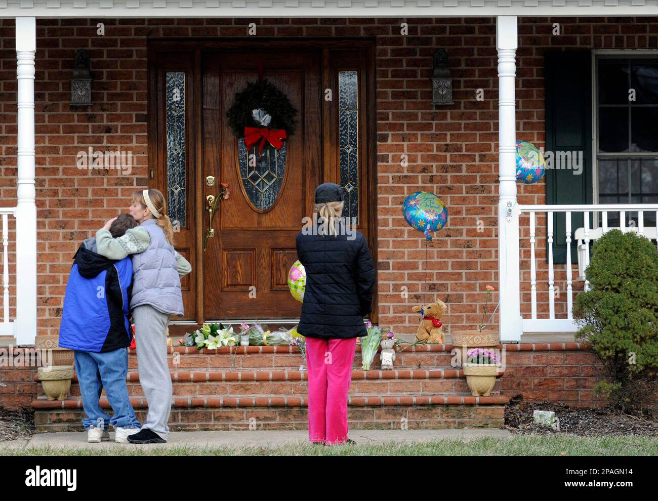Jennifer Welsh, second from left, her daughter Sara Welsh, right, and a ...