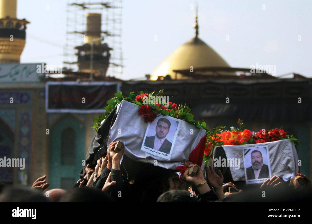 Coffins with the bodies of two bodyguards of Abdul Mahdi Al-Karbalai ...