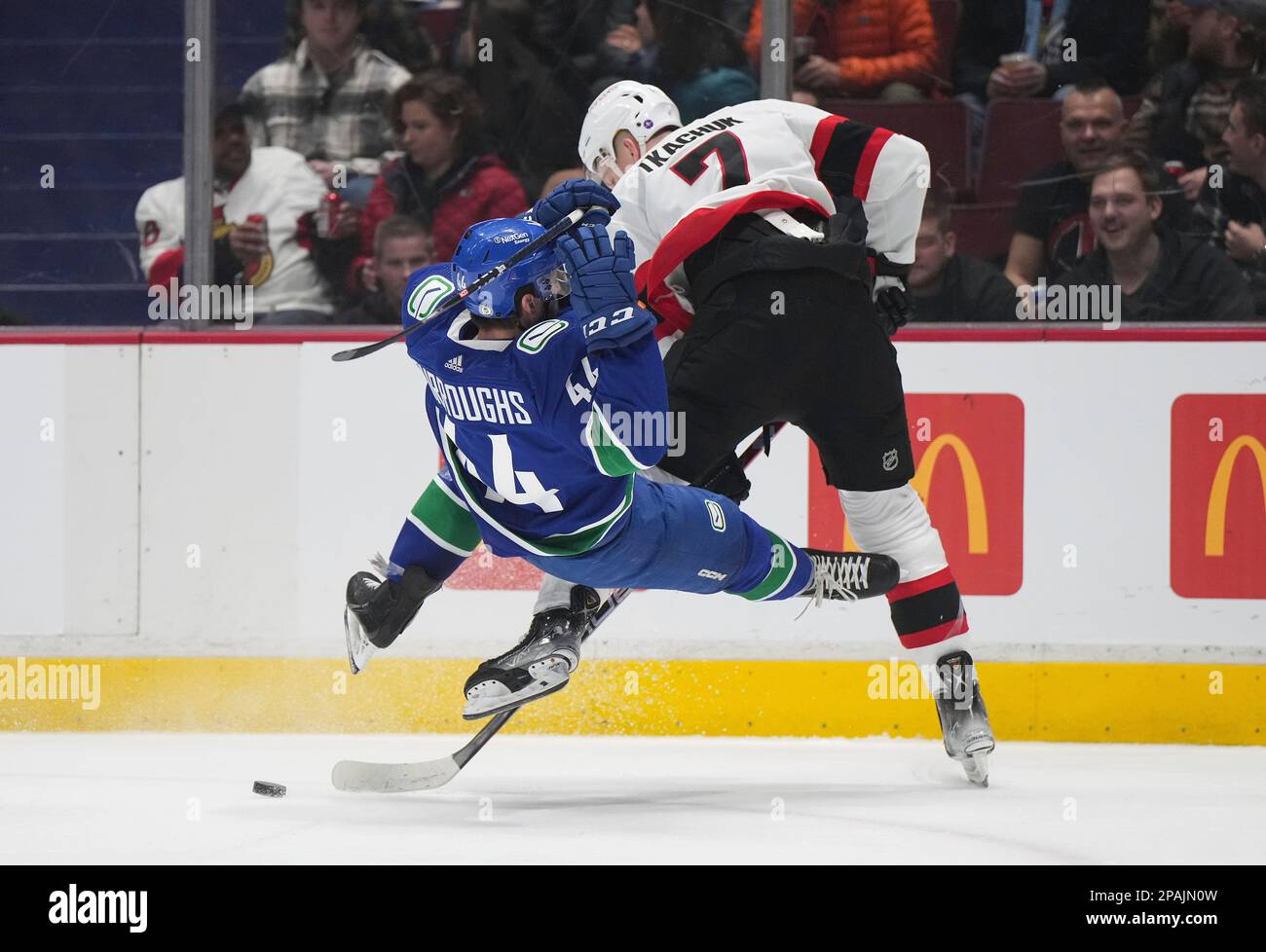Vancouver Canucks' Kyle Burroughs (44) and Ottawa Senators' Brady ...