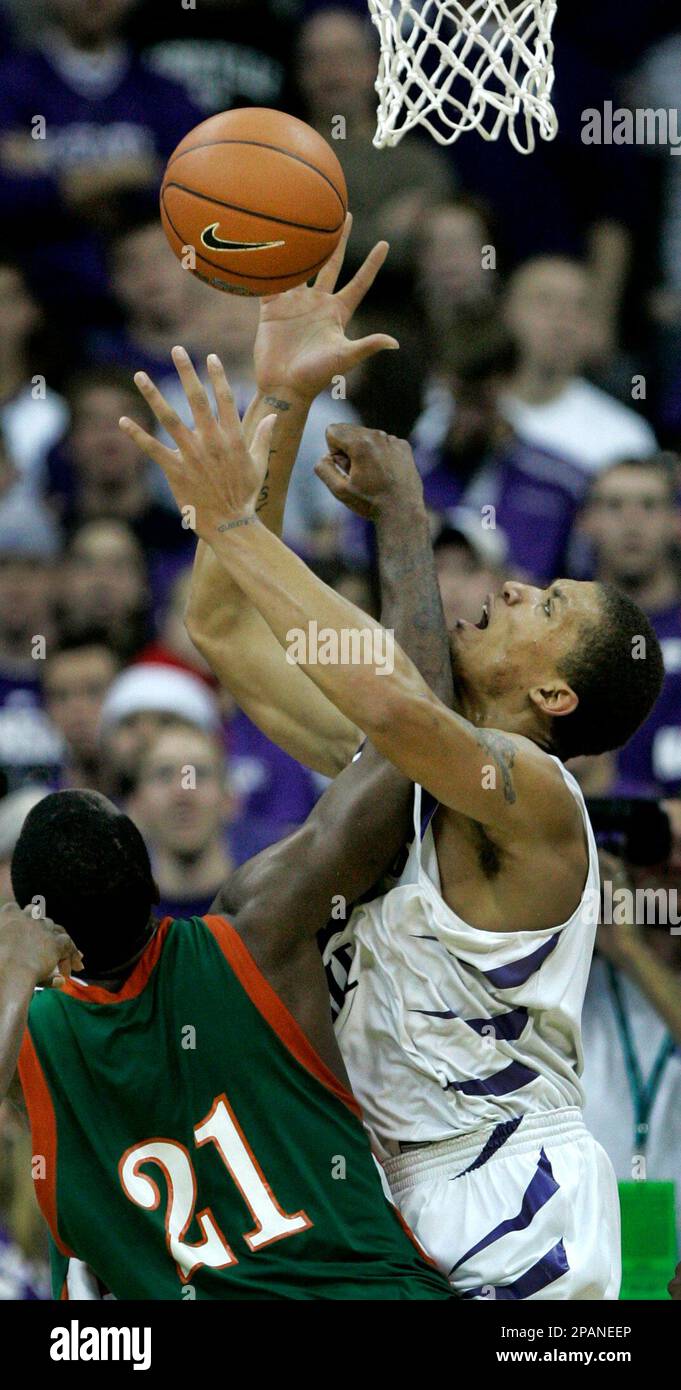 Kansas State forward Michael Beasley, right, is fouled by Florida A&M ...