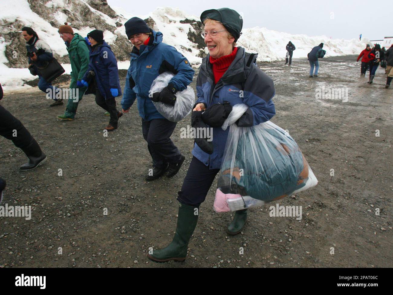Passengers of the Canadian ship MS Explorer walk towards a Chilean Air ...