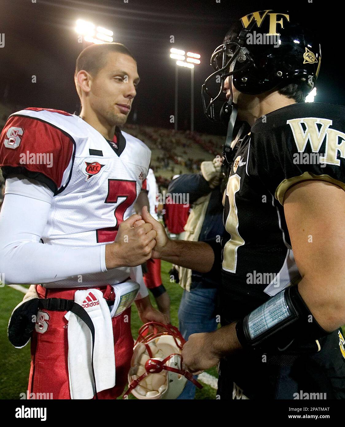North Carolina State quarterback Daniel Evans, left, and Wake Forest ...