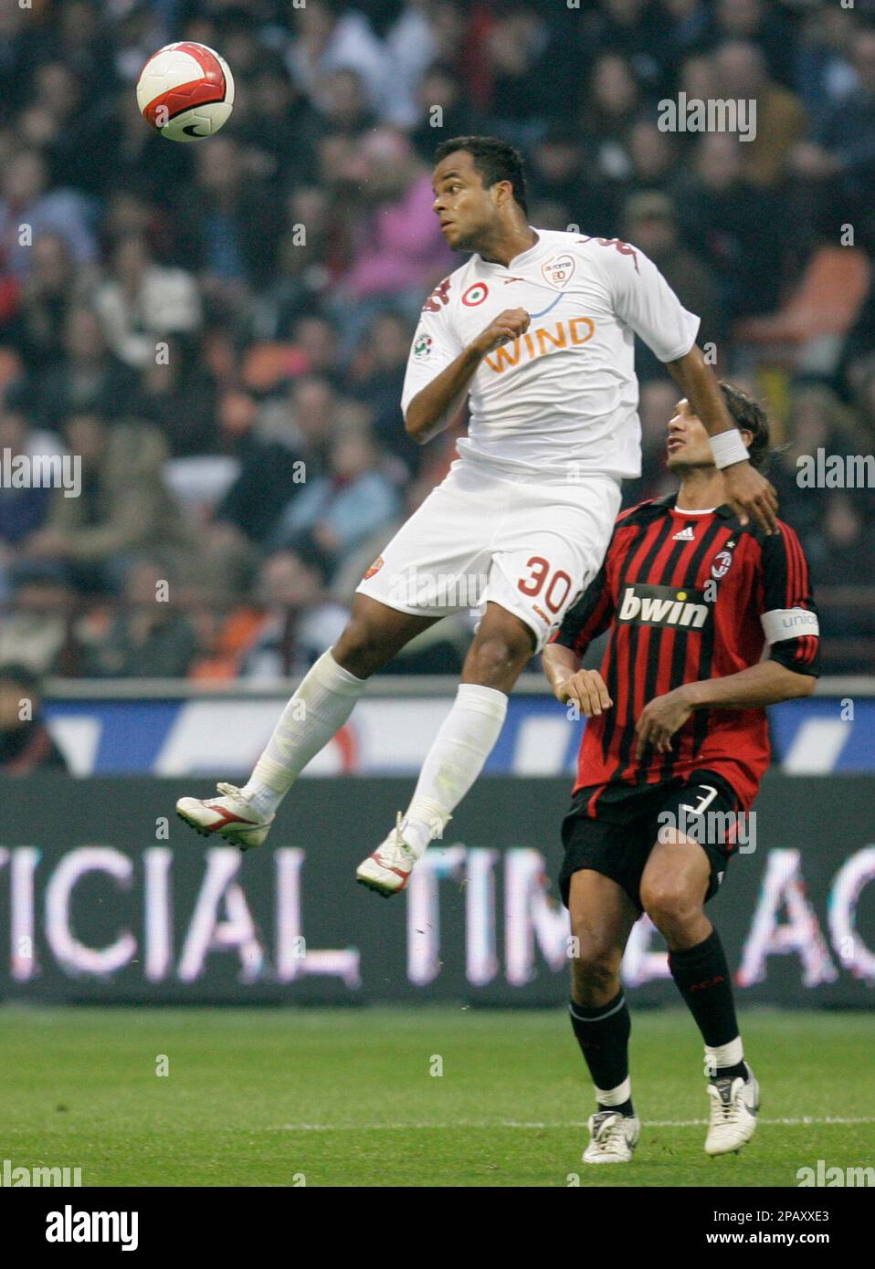 AS Roma's Diamantino Mancini of Brazil, left, heads the ball while AC ...