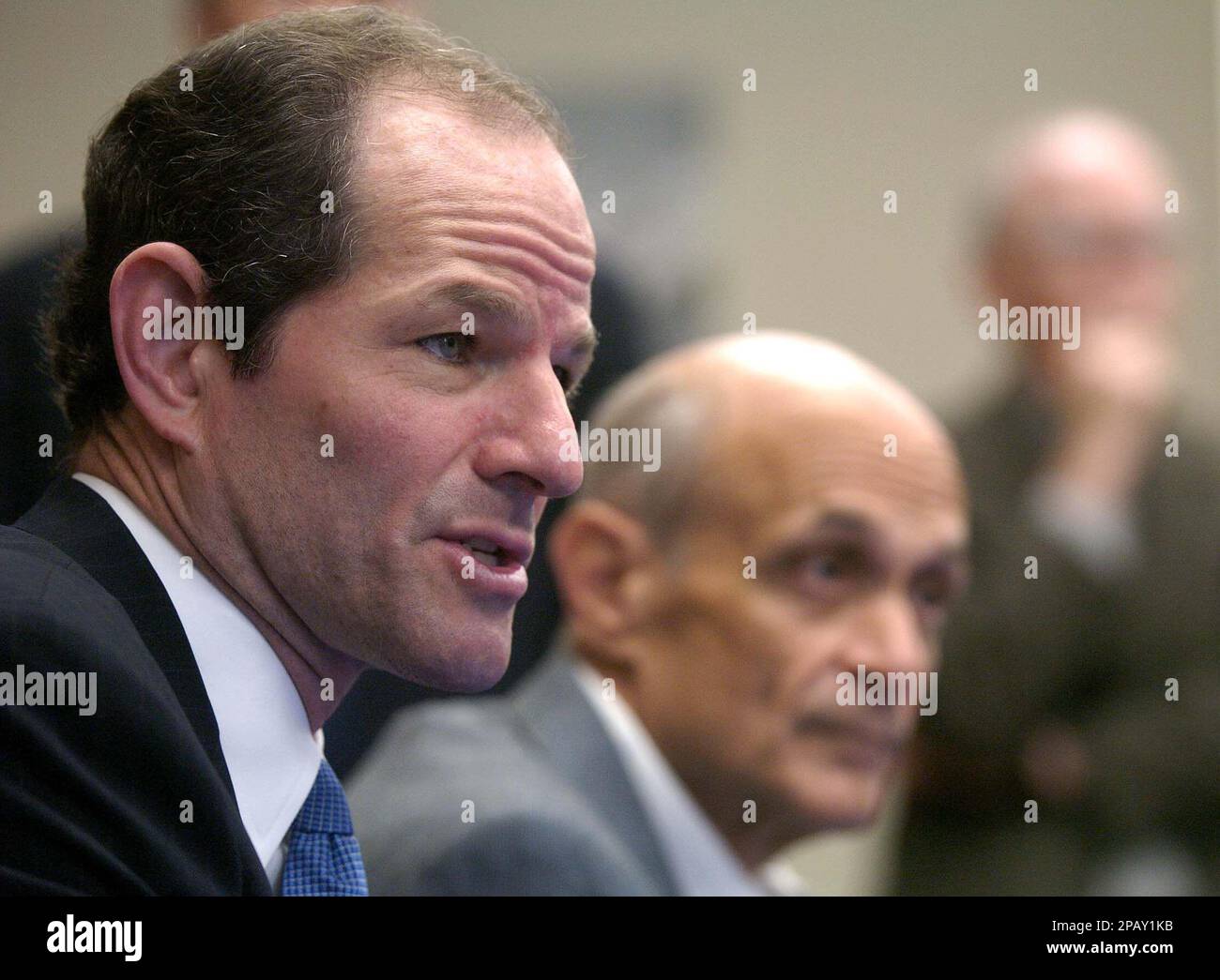 New York Gov. Eliot Spitzer, left, speaks at a news conference with ...