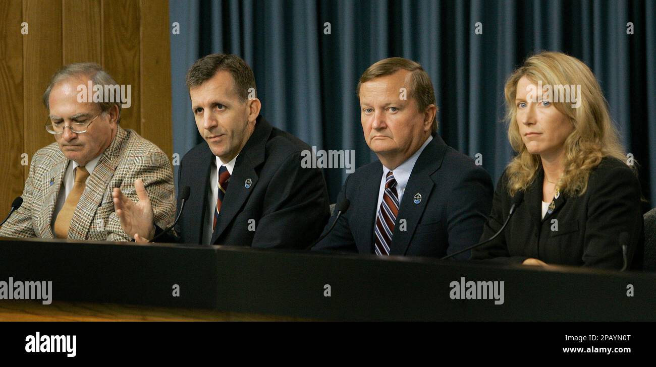 LeRoy Cain, Space Shuttle Launch Integration Manager, second from left ...