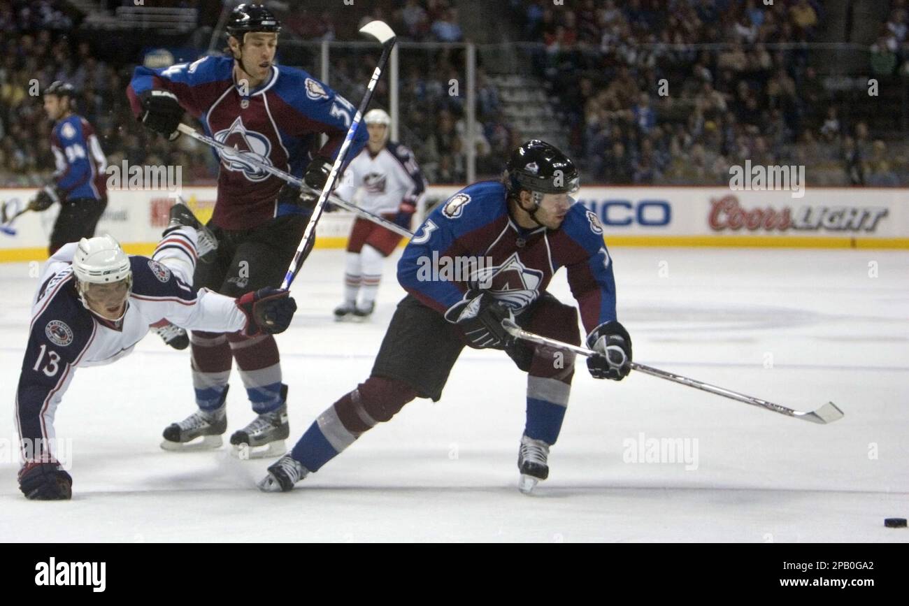 Columbus Blue Jackets Nikolai Zherdev, left, loses his footing while ...