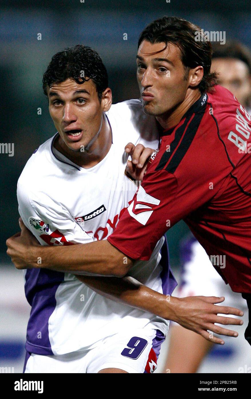 Fiorentina's Pablo Daniel Osvaldo of Argentina, left, and Livorno's ...