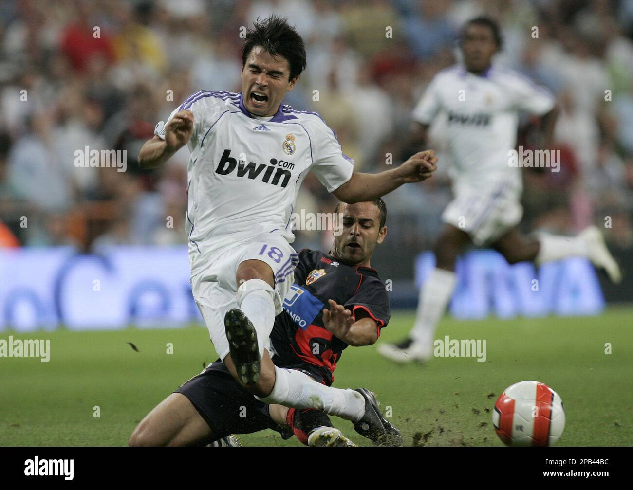 Real Madrid's Javier Saviola of Argentina is fouled by Almeria's Albert ...