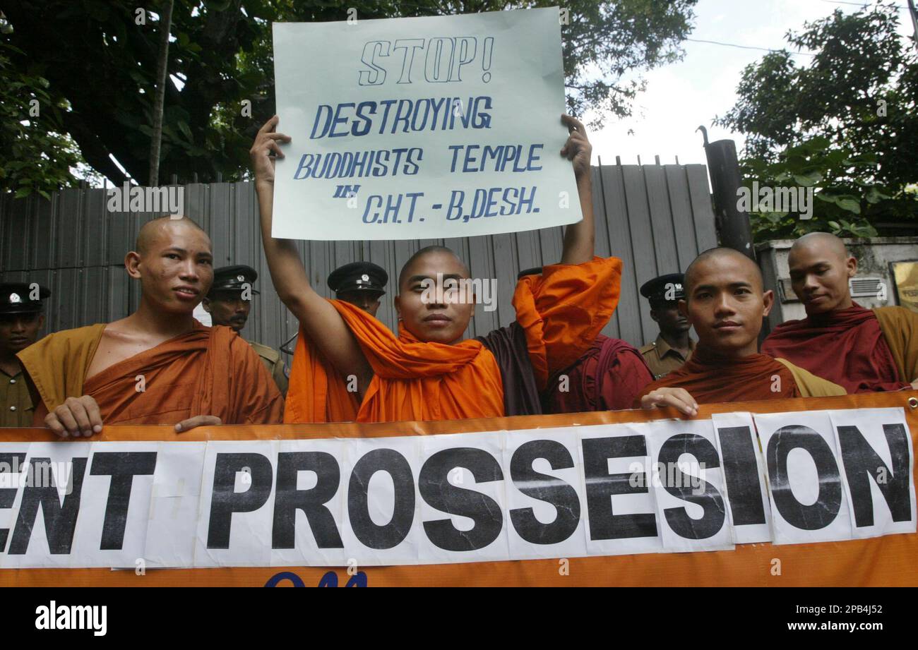 Bangladesh origin Buddhist monks hold placards during a protest out ...