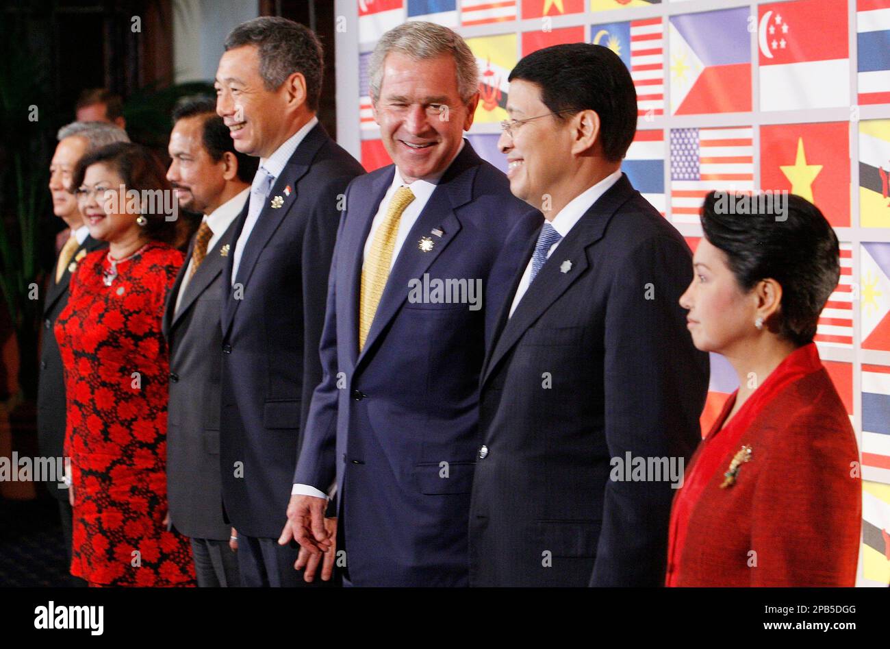 President Bush poses for a picture after his meeting with leaders of ...