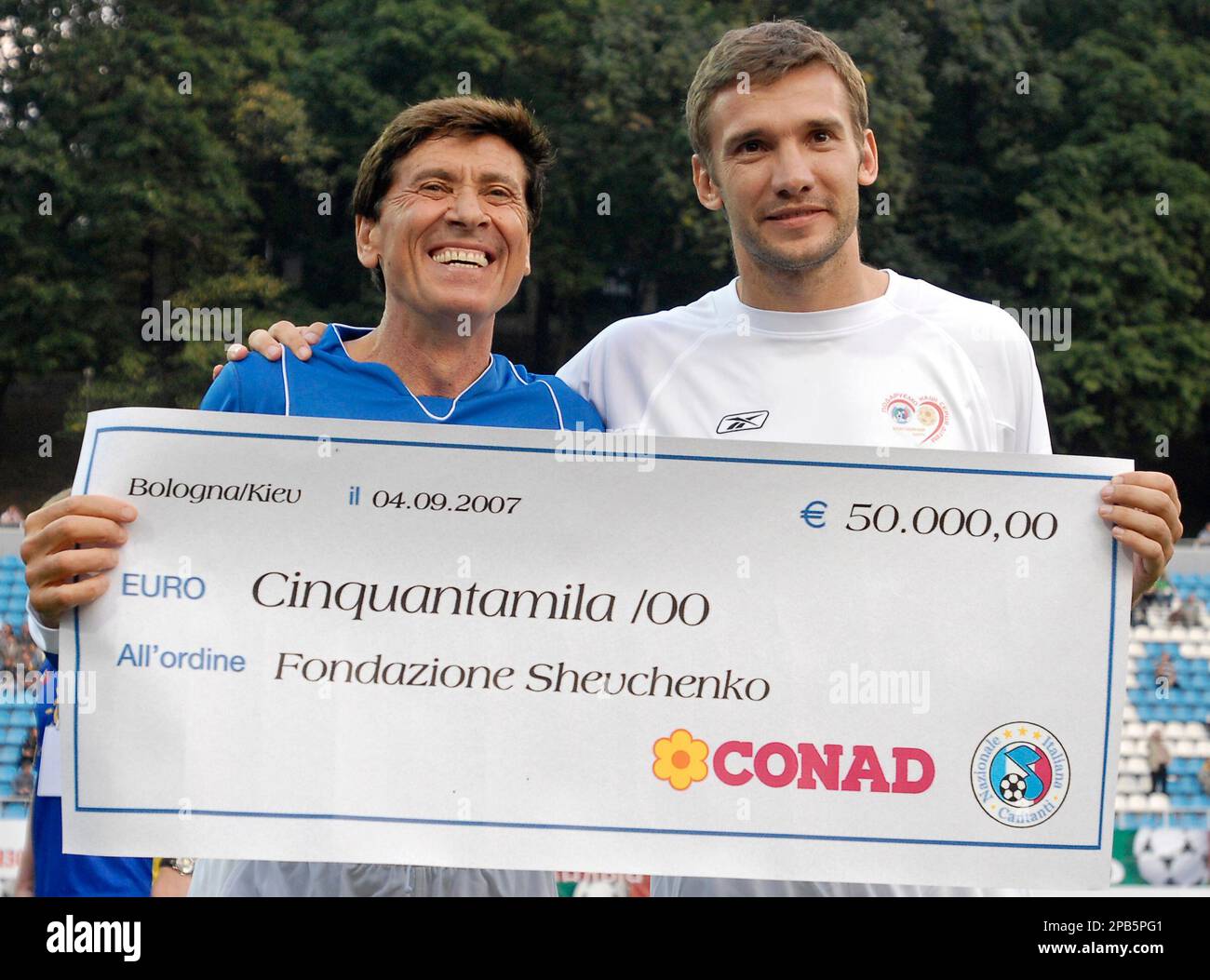 Andriy Shevchenko, right, and the Italian singer and the actor Gianni ...