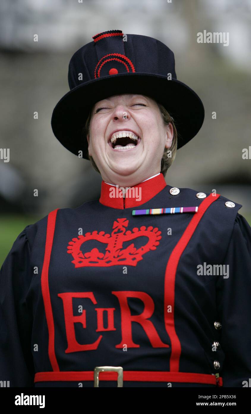 Yeoman Warder Moira Cameron, the first female Beefeater, laughs as she ...