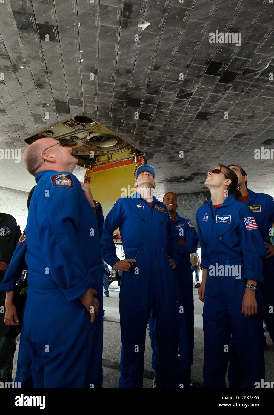 STS-118 Crew members, from left, Commander Scott Kelly, and Mission ...