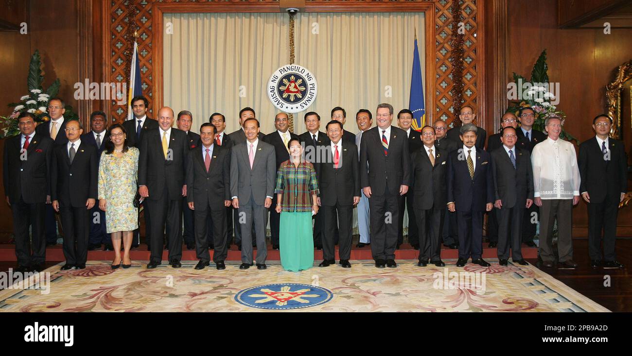Philippine President Gloria Arroyo, 7th from left, poses with ASEAN ...