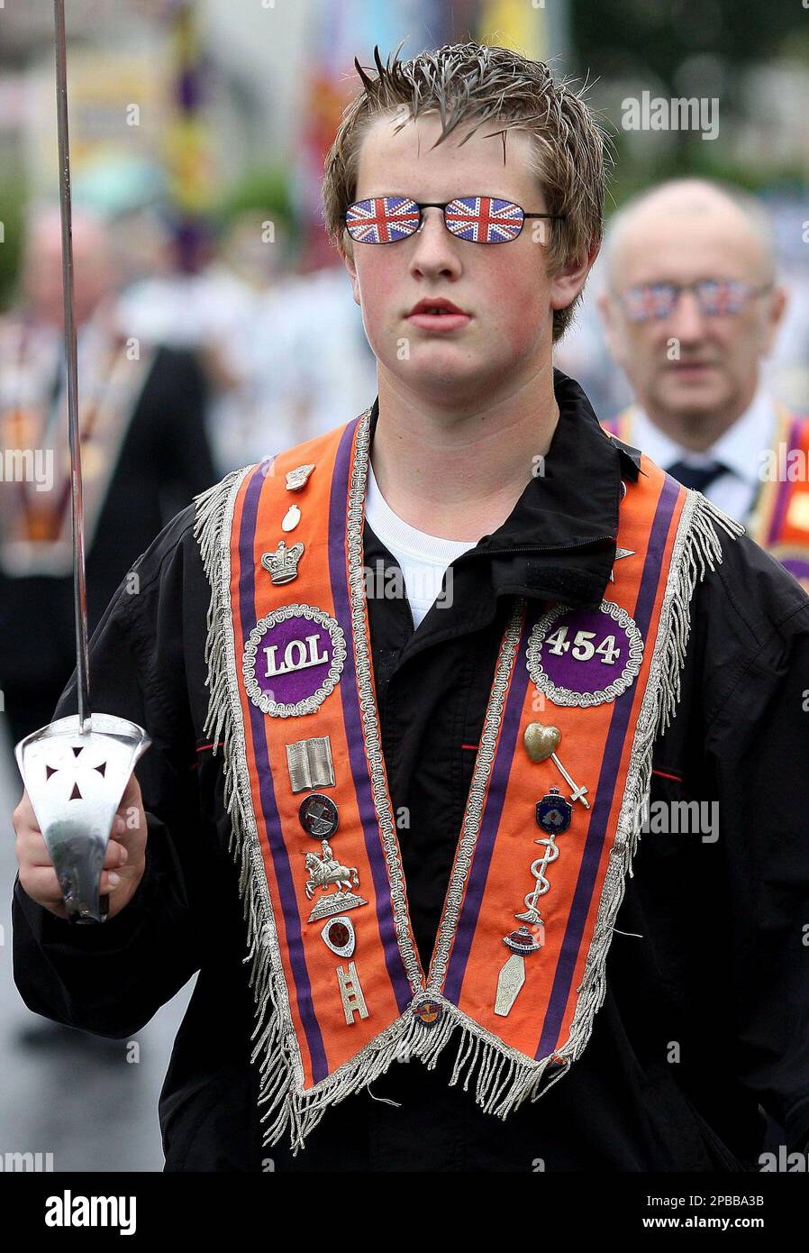 A member of the Orange order parades through South Belfast, Northern ...