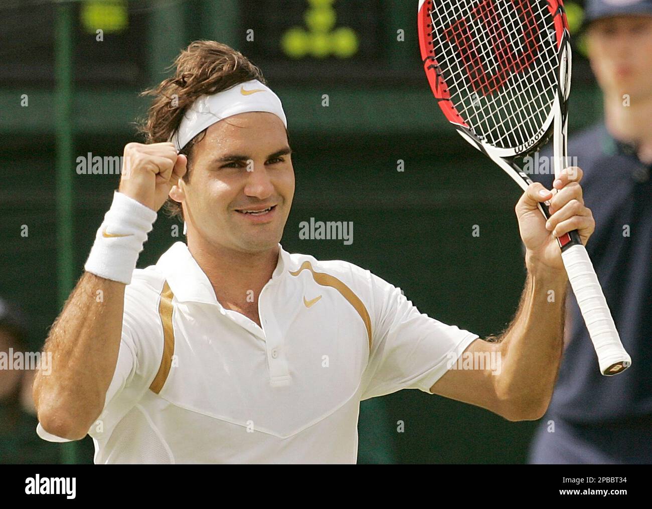 Defending champion Roger Federer reacts as he defeats Spain's Juan ...