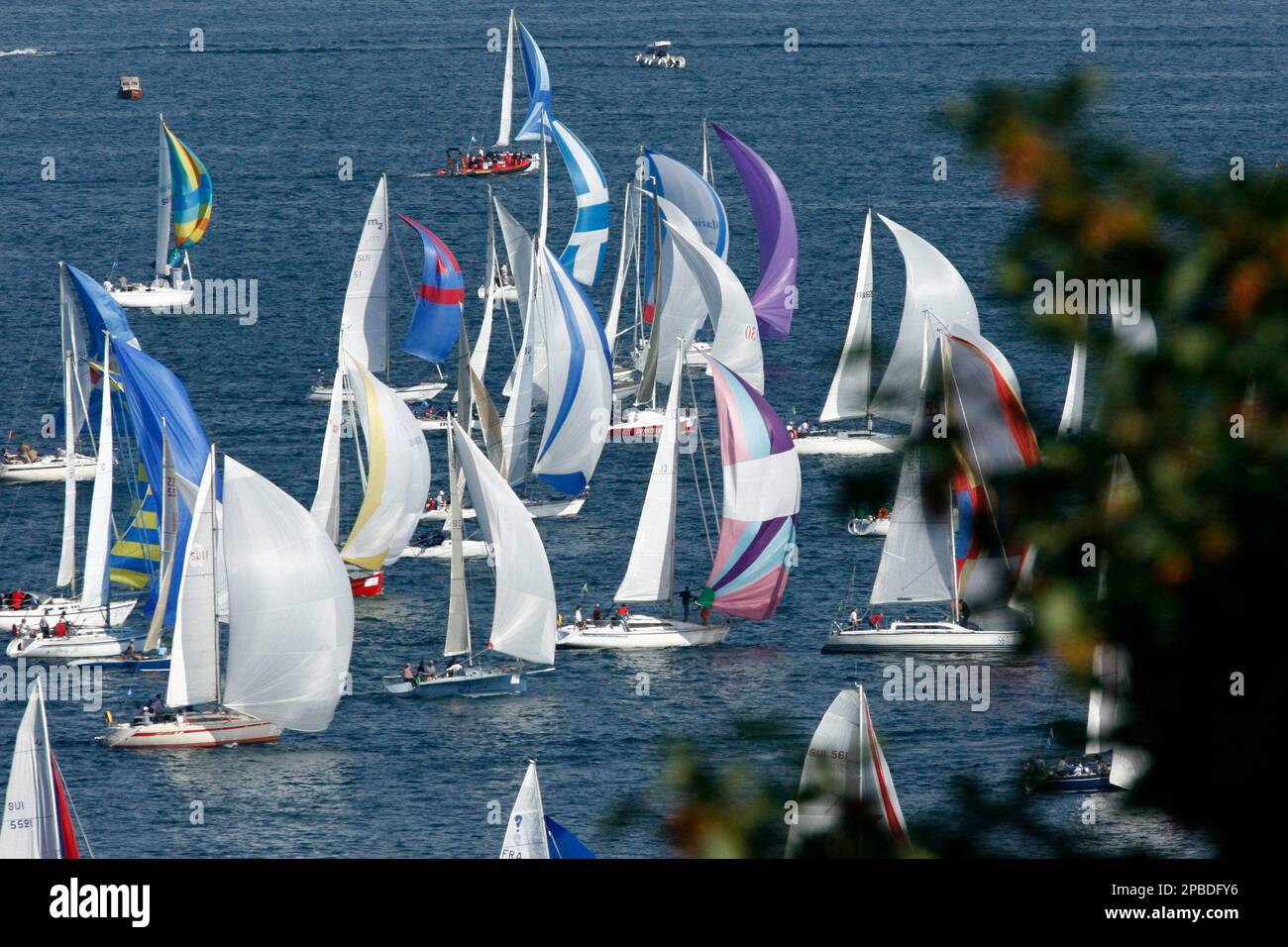 Sailing boats cross the starting line of the '"Bol d' Or", a sailboat ...